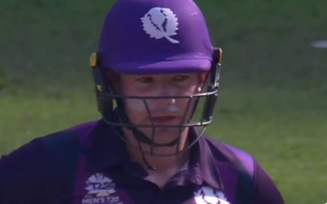 Scotland's Matthew Cross encourages bowler to take wicket for India